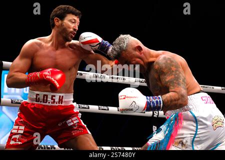 Adam Brooks (left) in action against Gavin Proctor in the light ...