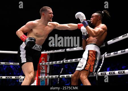 Wade Plemons (left) in action against Moziah Pinder in the light ...