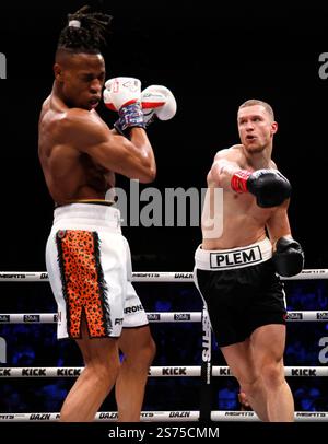Moziah Pinder (right) in action against Wade Plemons in the light ...