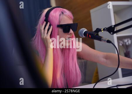 Beautiful young singer and musician broadcast from her home studio ...