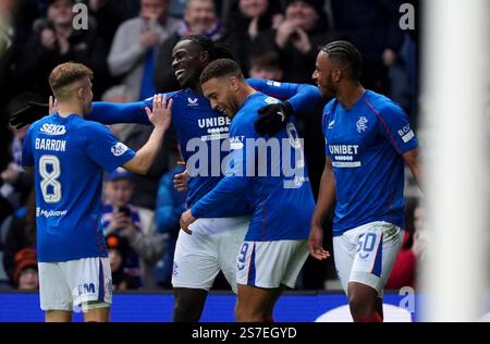 Rangers' Clinton Nsiala (second left) celebrates with his team mates ...