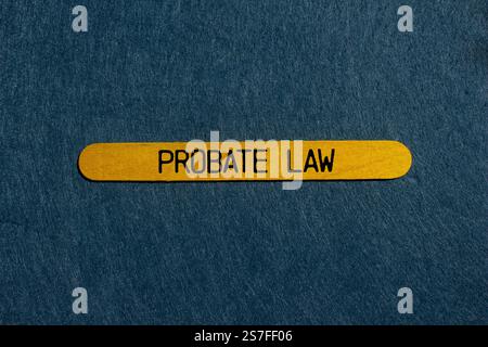 Probate law message written on ripped torn paper piece with cardboard ...