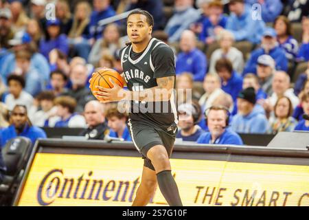 Providence guard Corey Floyd Jr. (14) dribbles the ball against St ...