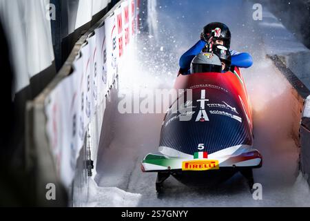 Patrick Baumgartner, Eric Fantazzini, Robert Mircea and Lorenzo Bilotti, of Italy, finish their ...