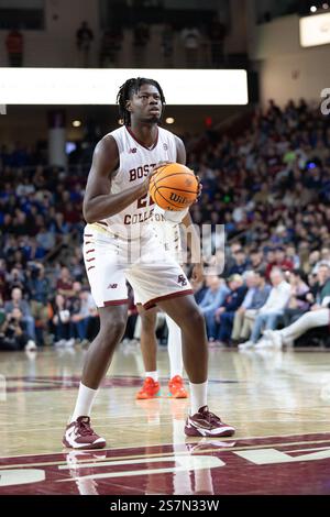 Boston College forward Jayden Hastings, top, and Clemson guard Jaeden ...