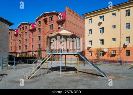 Kids playground from the soviet era in a residential area of downtown ...