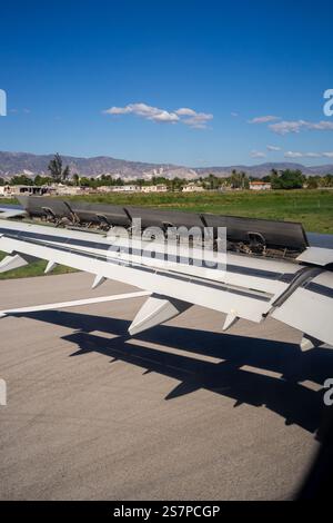 aircraft wing spoiler deployed during landing showing hydraulics Stock ...