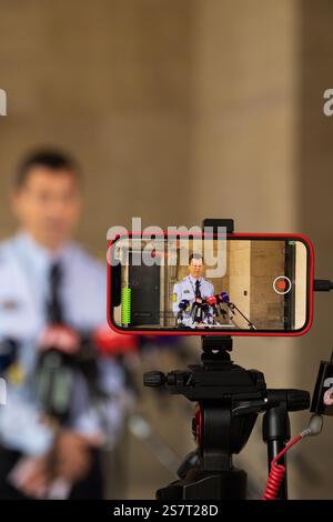 Deputy Police Inspector Brian Belling attends a press briefing at the ...