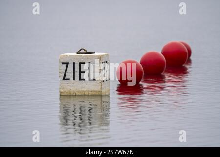 Target buoy on a lake, red marker buoys for water sports, regattas ...