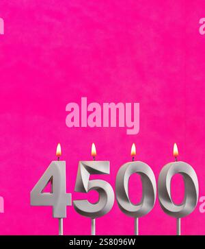 Number of followers or likes - Candle number 4500 Stock Photo - Alamy