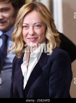 Italy's Prime Minister Giorgia Meloni listens as President Donald Trump ...