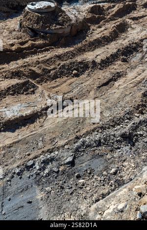 a part of the excavated pits during construction work on the road, the ...