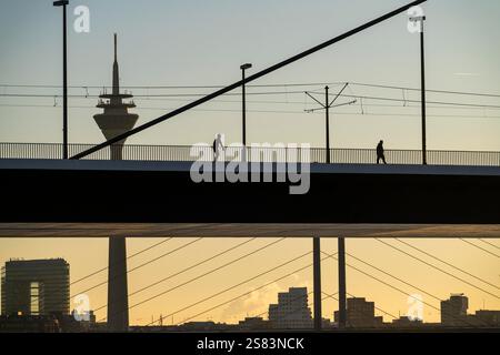 Pedestrians on the Oberkassler Rhine Bridge, Rhine Tower, behind the ...