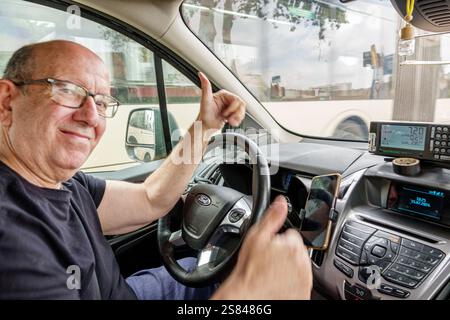 Taxi cab interior view from the backseat driving through Havana, Cuba ...