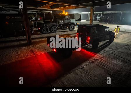 British military vehicles are marshalled as they arrive at a Hungarian ...