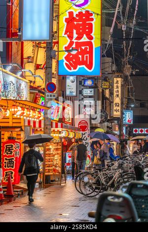 View of colourful signs in backstreet in Dotonbori, vibrant ...