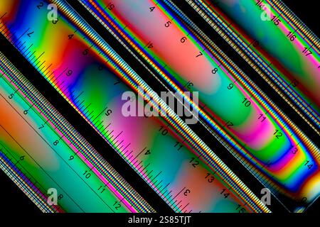 Four plastic rulers from a Geometry set, photographed using cross ...