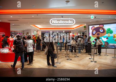 Visitors inside Nintendo store in Shibuya look at the merchandise on ...