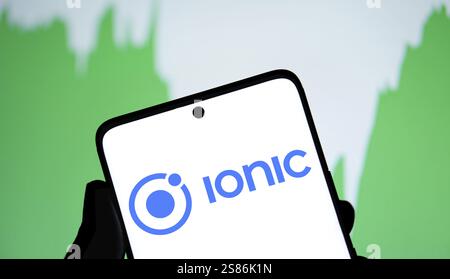 Ionic logo is displayed on smartphone. Ionic is an open-source UI ...