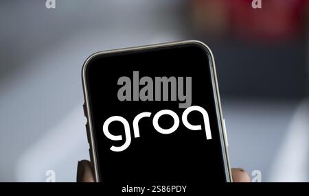 Groq logo is displayed on smartphone. Groq, Inc. is an American ...