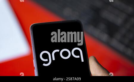 Groq logo is displayed on smartphone. Groq, Inc. is an American ...