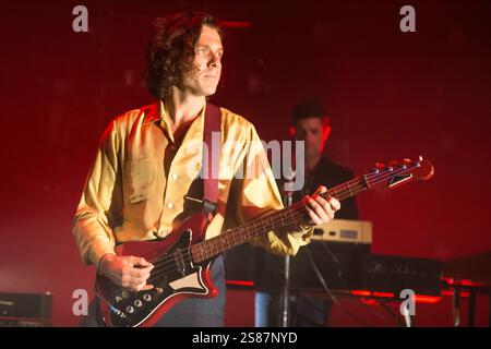 Nick O'Malley of The Arctic Monkeys performing at Revolution Live Fort ...