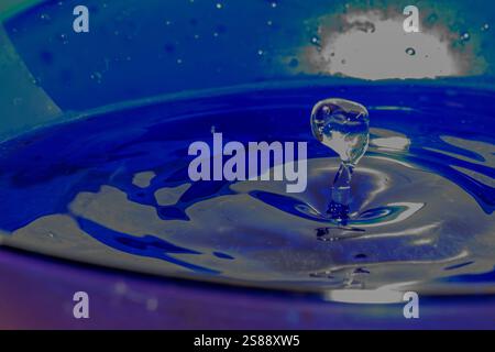 Water dripping into a glass bowl Stock Photo - Alamy