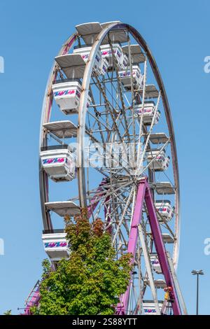 Fairgrounds exhibition with games, rides and signs at CNE Toronto ...