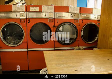 Washing machines seen inside self service laundry. (Photo by Kristian ...