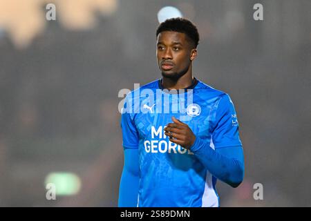 Emmanuel Fernandez (37 Peterborough United) heads the ball clear during ...