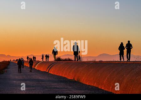 Sunset stroll, Iona Jetty, Iona Beach Regional Park, Richmond, British ...