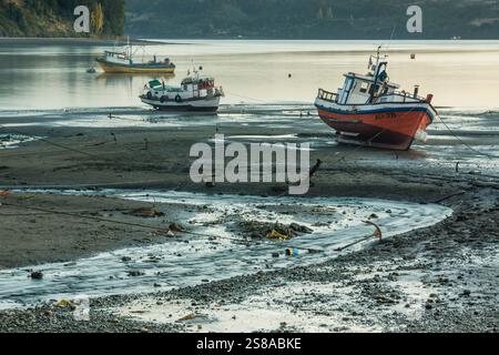 Stranded boats at low tide, Dalcahue, Chiloé Island, Patagonia ...