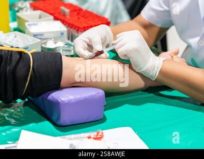 Doctor takes blood sample to check hemoglobin level closeup Stock Photo ...
