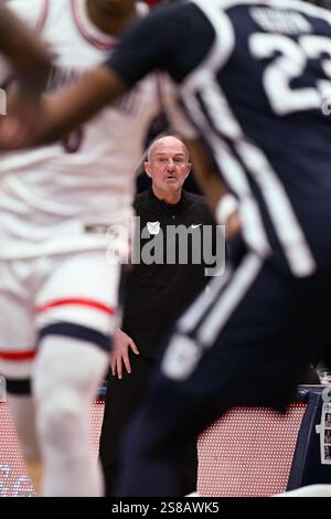 Butler head coach Thad Matta, left, talks with St. John's head coach ...