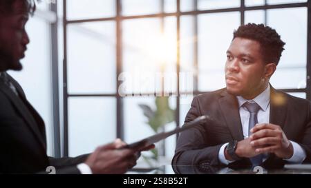 two African Americans signed a cooperation agreement Stock Photo - Alamy