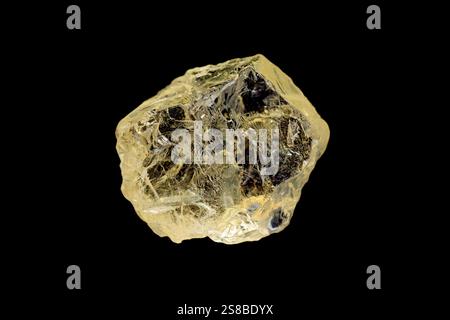 Natural rough transparent orthoclase (jewelry grade) on dark background ...