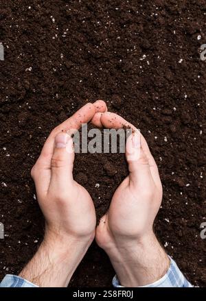 Handful of Rich Brown Soil Stock Photo - Alamy
