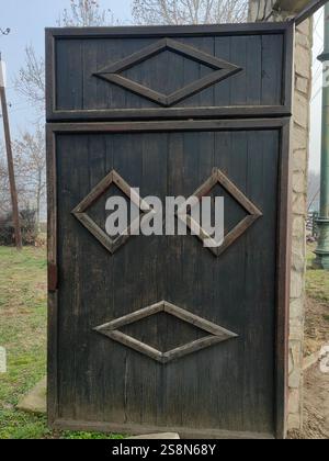 The Silent Observer: Abstract Face in Wooden Door Frame Stock Photo - Alamy