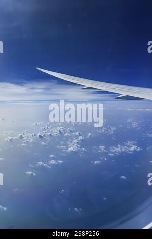 Blue sky, cloud structures over the Arabian Sea. View from the aircraft ...