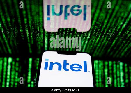 In this photo illustration, the Intel logo seen displayed on a ...