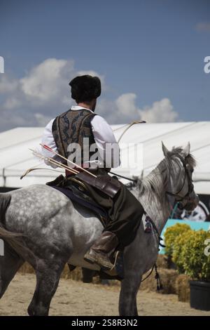 Horseman archer riding in ethnic clothes on horseback Stock Photo - Alamy