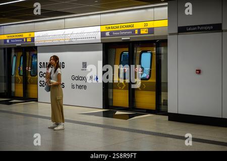 Waiting for an Malaysian MRT train at Tun Razak Exchange (TRX), Kuala ...