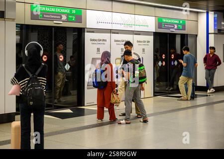 Waiting for an Malaysian MRT train at Tun Razak Exchange (TRX), Kuala ...