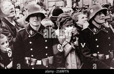 Austrian crowds show emotion and anticipation as German forces enter ...