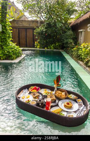 Floating Breakfast tray in swimming pool at luxury hotel or tropical ...
