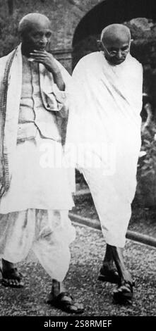 Mahatma Gandhi during a hunger strike is accompanied by Indira (Nehru ...