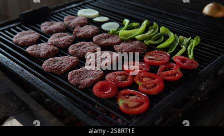 Turkish style barbecue meatballs, meatballs, onion, tomato, green ...