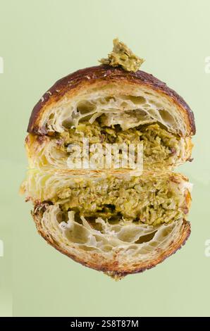 Croissant stuffed with pistachio paste and kadaif dough covered with ...