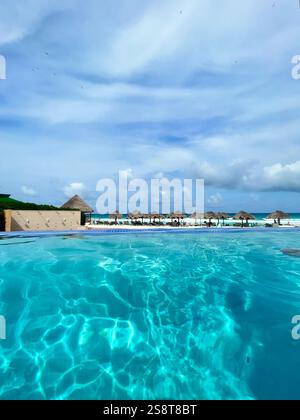 Infinity Pool at a resort in Cancun Mexico Stock Photo - Alamy