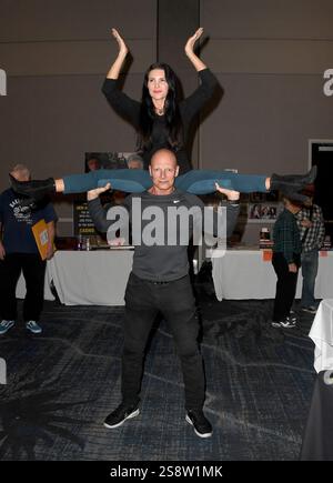 Actors Mercy Malick and Joseph Gatt perform an acrobatic act at the ...